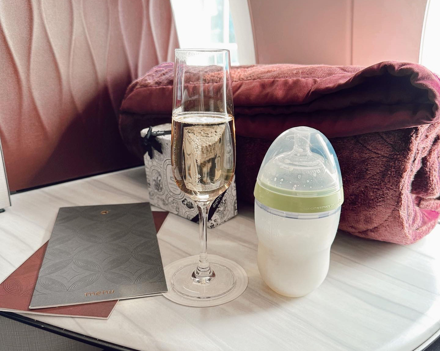 Flying Qatar Airways Qsuites with a Baby - The Baby Abroad